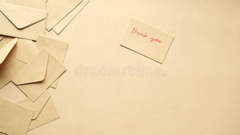 Slow Motion of Dropping Thank You Message on Table Stock Footage ...