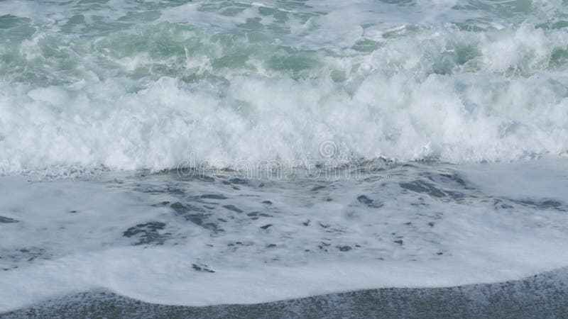 Element of Nature. White Wave Bubble Hits Fine Beach. Cinematic ...