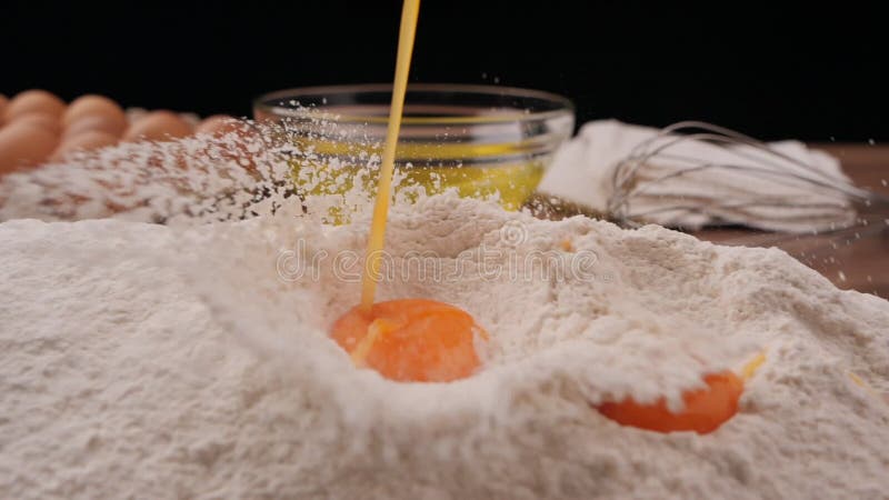 Slow Motion of Falling Eggs into Flour Stock Video - Video of baking ...