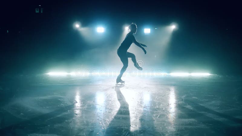 Slow Motion of a Figure Skater Jumping at the Rink Stock Video - Video ...