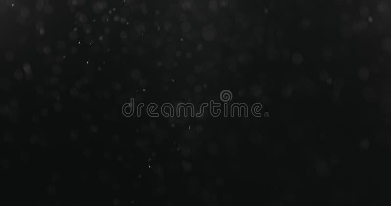 Slow Motion of Fine Dust Particles Falling on Black Background Stock ...