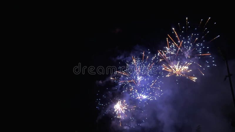 Slow Motion Fireworks Exploding Then Sparkling Against Pitch Black Sky ...