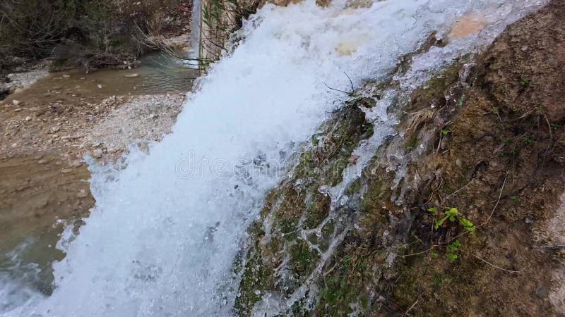 Slow Motion Waterfall Flowing between Rocks from River Perspective ...