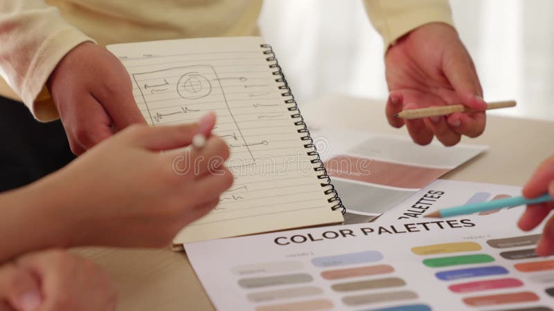 Slow Motion Hand Closeup of Two Designer Choosing Color in Office ...