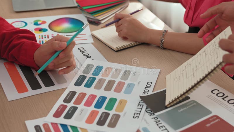 Slow Motion Hand Closeup of Two Designer Choosing Color in Office ...