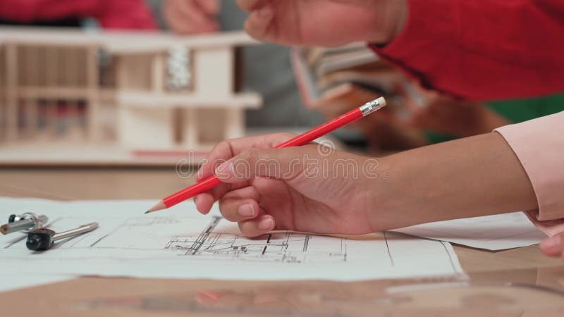 Skilled Interior Designer Team Focusing on Their Performance ...