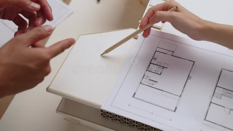 Skilled Interior Designer Team Focusing on Their Performance ...