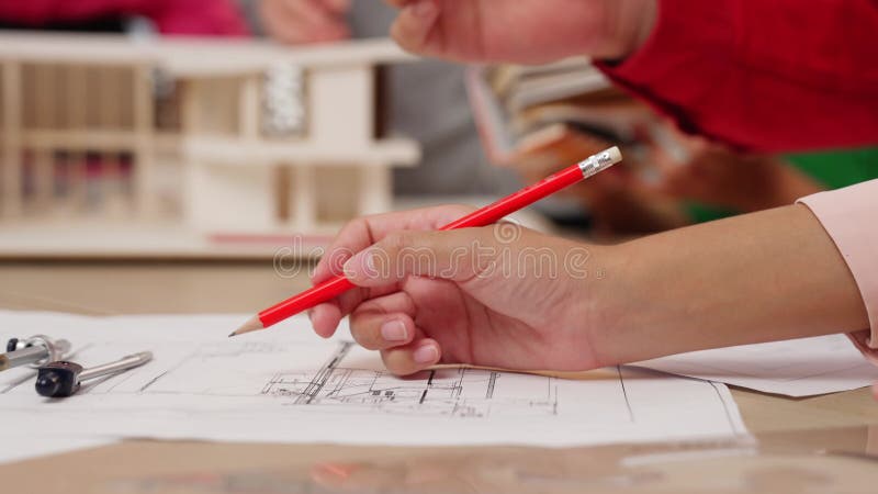 Skilled Interior Designer Team Focusing on Their Performance ...