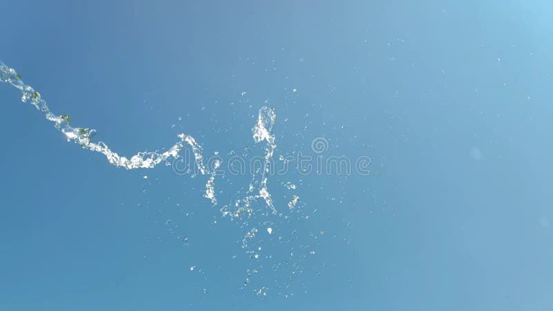 Slow Motion of a Jet of Water Splash on Blue Sky Background Stock Video ...