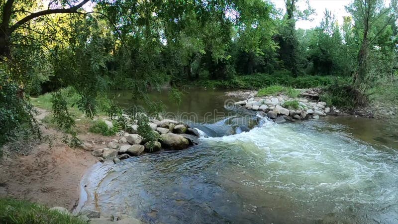 Slow Motion Landscape with Spring Water River Flowing on a Small ...