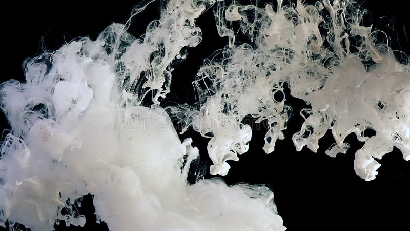 Slow Motion of Liquid White Ink. White Cloud of Ink on a Black ...