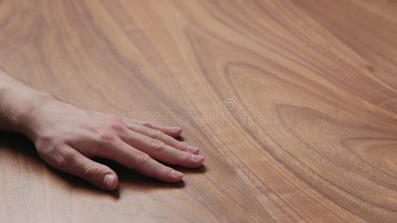 Slow Motion Man Hand Waiting on Black Walnut Table Stock Footage ...