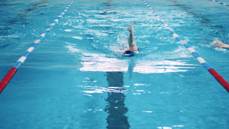 Slow Motion of a Man Swimming Breaststroke in a Front View Stock ...