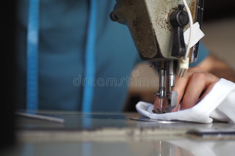 Slow Motion of Men Hands Using a Sewing Machine . Stock Photo - Image ...
