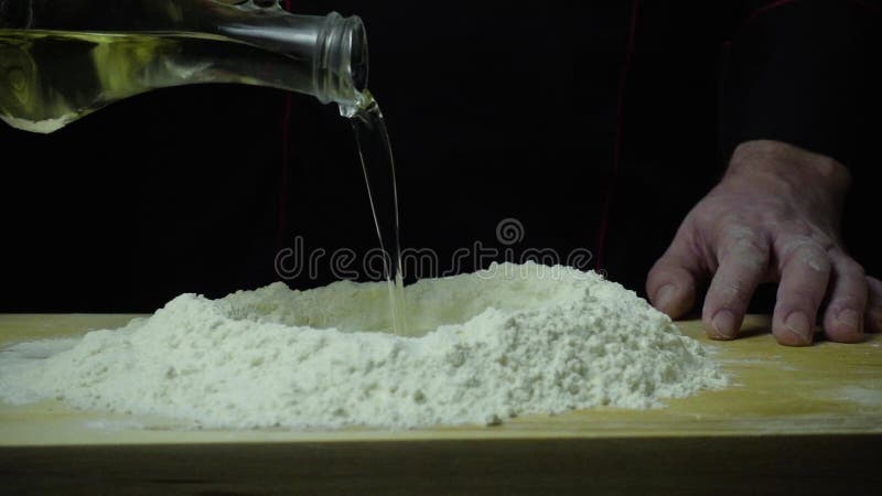 Slow Motion Olive Oil Poured into the Flour Stock Video - Video of ...