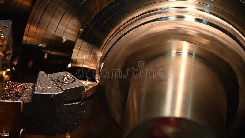 The Operation of Lathe Machine Cutting the Brass Shaft Material. Stock ...