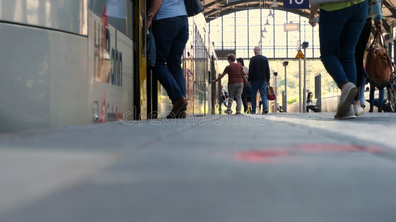 Slow-motion of Passengers Walking by on Train Station Platform in ...