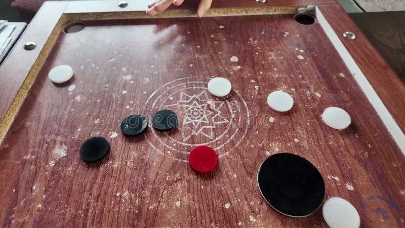 Slow-motion of Person S Hand while Playing Carrom Board Stock Footage ...