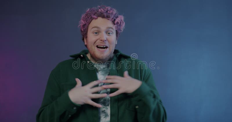 Slow Motion Portrait of Overjoyed Young Man Screaming and Clapping ...