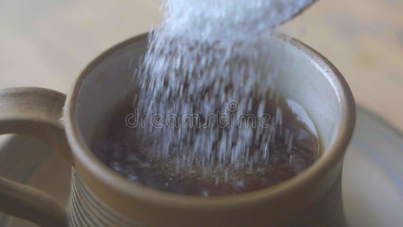 Slow Motion of Pouring White Sugar in a Tea Cup , Stock Video - Video ...