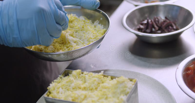 Slow-motion of the Process of Adding the Topping on Peruvian Causa in ...