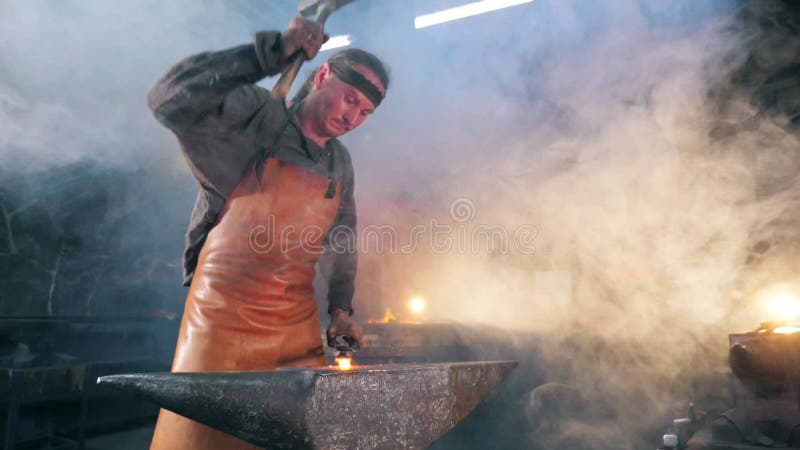 Slow Motion Process of Metal Forging Held by the Craftsman Stock Video ...