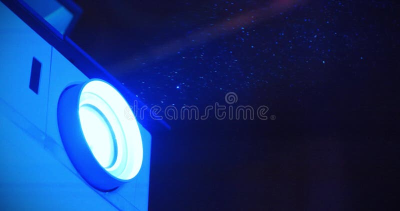 Slow Motion Projector in Operation. Dust in Cinema Hall is Visible in ...