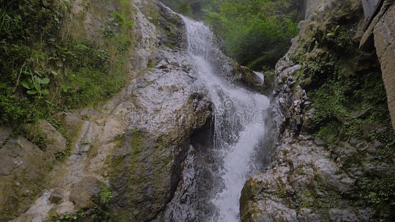 Slow Motion: Stream is Flowing and Falling Down, Waterfall in the ...