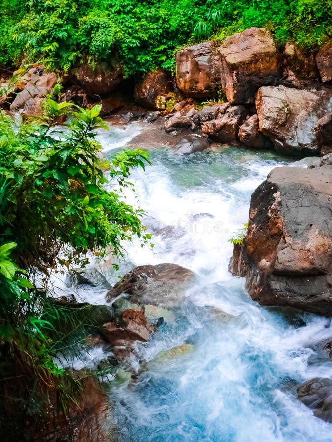 Slow Motion Rushing Water through the Beautiful River Rocks Stock Image ...