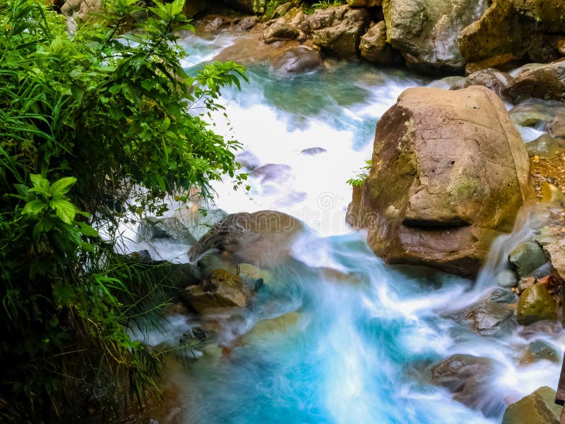 Slow Motion Rushing Water through the Beautiful River Rocks Stock Photo ...