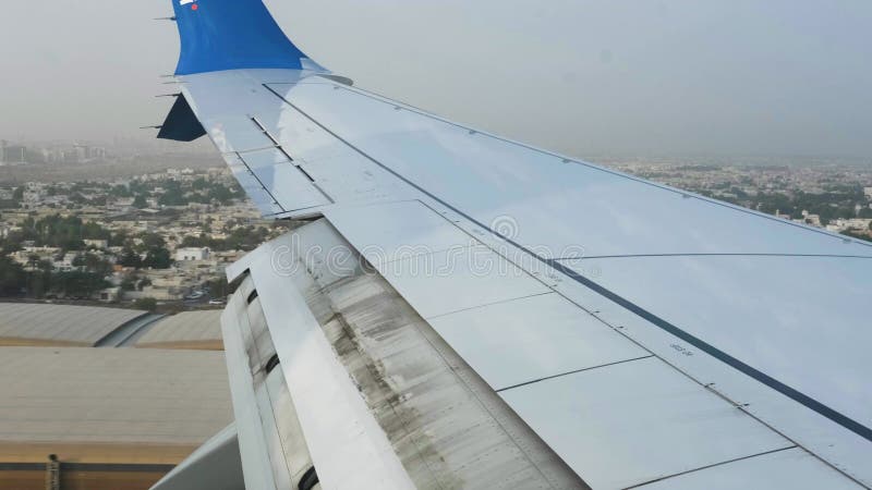 Airplane Wing Extending Flaps during Landing in Slow Motion Stock ...