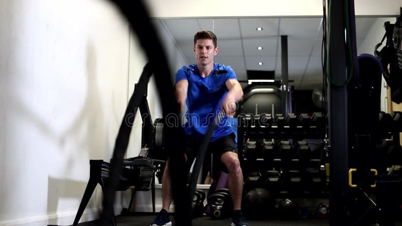 Slow Motion Sequence of Man in Gym Working Out Stock Video - Video of ...