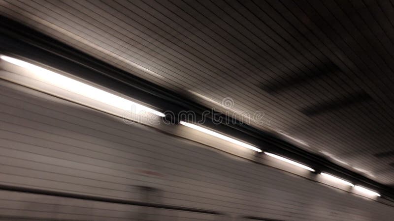 Slow Motion of a Sequence of Tunnel Lights Filmed in Motion Stock Video ...