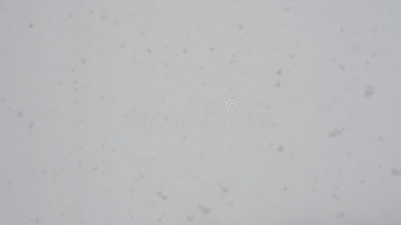 Slow Motion Snow Falling Over White Clouds Stock Footage - Video of ...