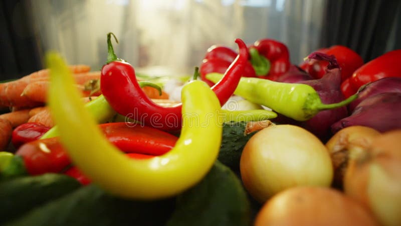 Slow Motion Video of Chili Peppers Falling on Vegetables. Stock Video ...
