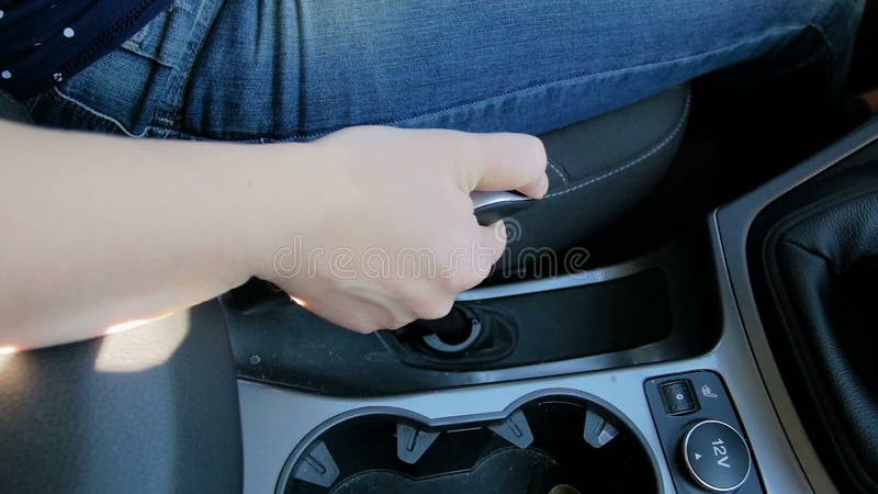 Slow Motion Footage of Driver Pulling Car Handbrake Lever after Parking ...