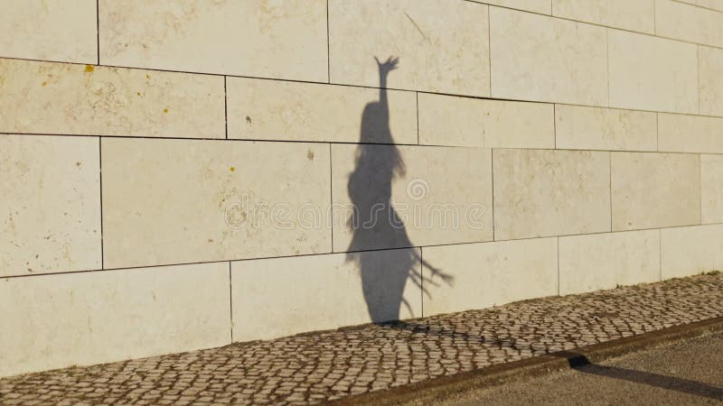 Shadow of Woman Dancing on a Wall in Slow Motion Stock Video - Video of ...