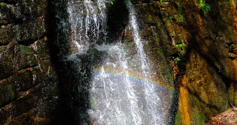 Slow Motion View of Cascade Stream with Rainbow Reflection of Light ...