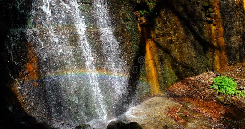 Slow Motion View of Cascade Stream with Rainbow Reflection of Light ...