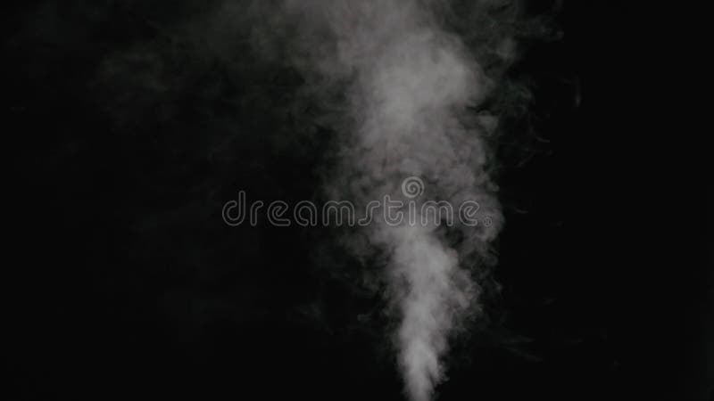 Slow Motion Water Mist Stream with Wind Effect Over Black Background ...