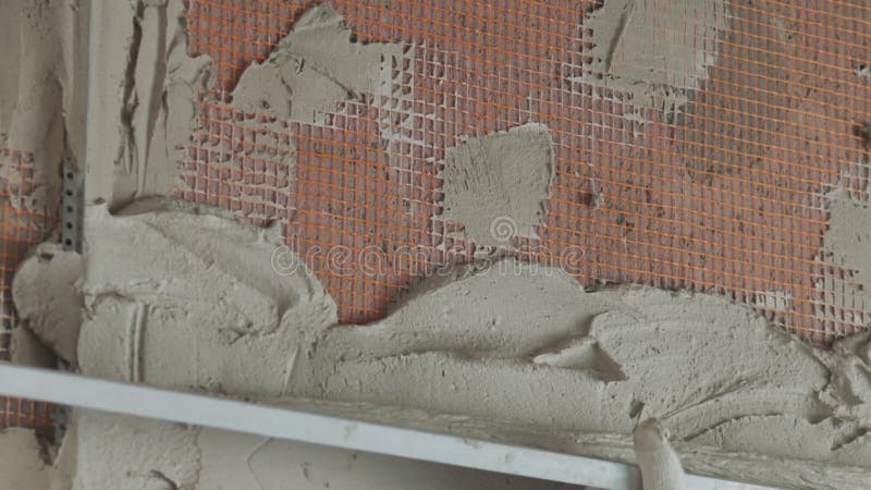 Slow Motion Worker Leveling Plaster on the Wall Stock Footage - Video ...
