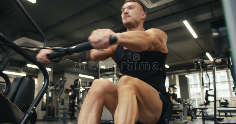 Slow Motion Young Athlete Performs Exercises with Weights To Strengthen ...