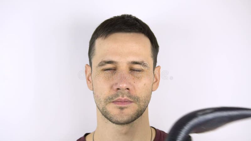 Slow Motion of a Young Handsome Guy Being Hit in the Face with a ...