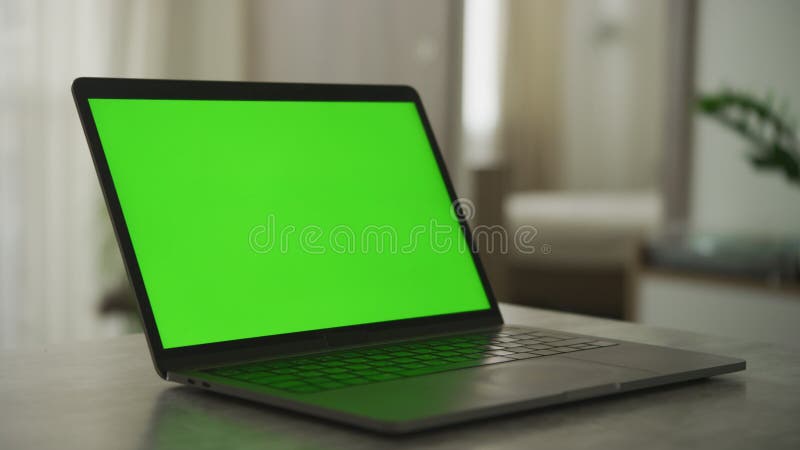 Slow Optical Zoom into a Laptop Computer Screen with a Green Screen on ...