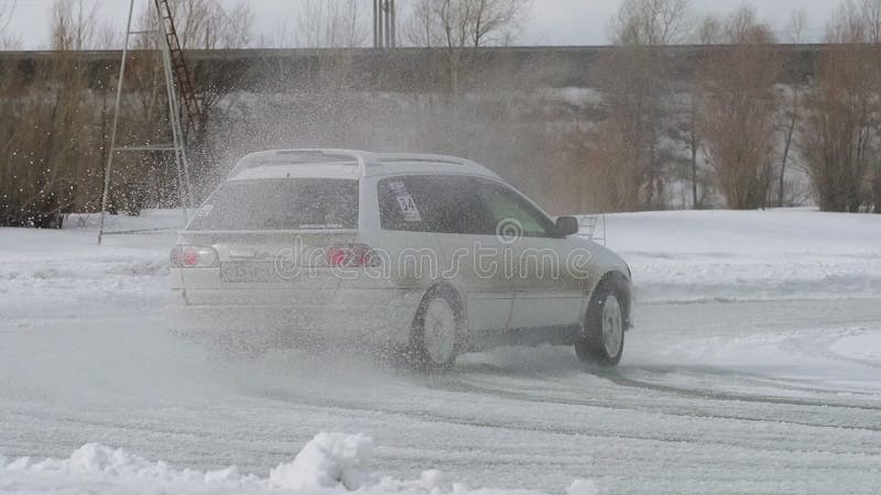 SLOW: Racing Car Turns on an Ice Road (back View) Stock Footage - Video ...