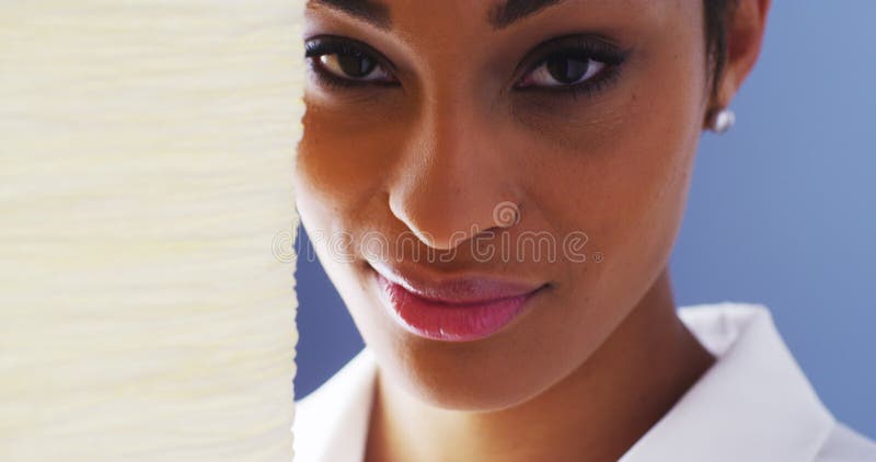 Slow Reveal of Attractive Black Woman Looking at Camera Stock Footage ...