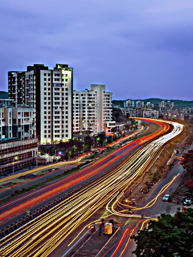 Slow Shutter Speed Image of Light Trails, Beautiful Sky , Buildings and ...