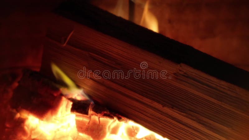 Slow and Warm Burning Fire with Glowing Embers and Flames on a Log in a ...