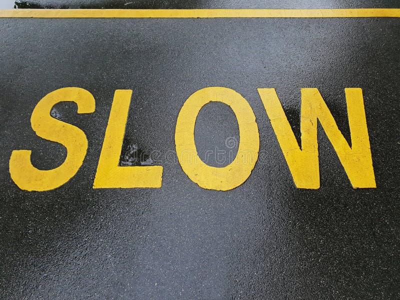 Slow wording on the path stock image. Image of text - 315517705