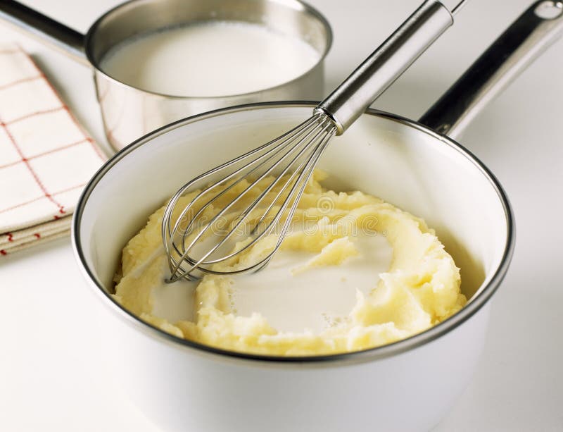 Slowly Adding the Milk while Mixing Stock Photo - Image of dish, style ...